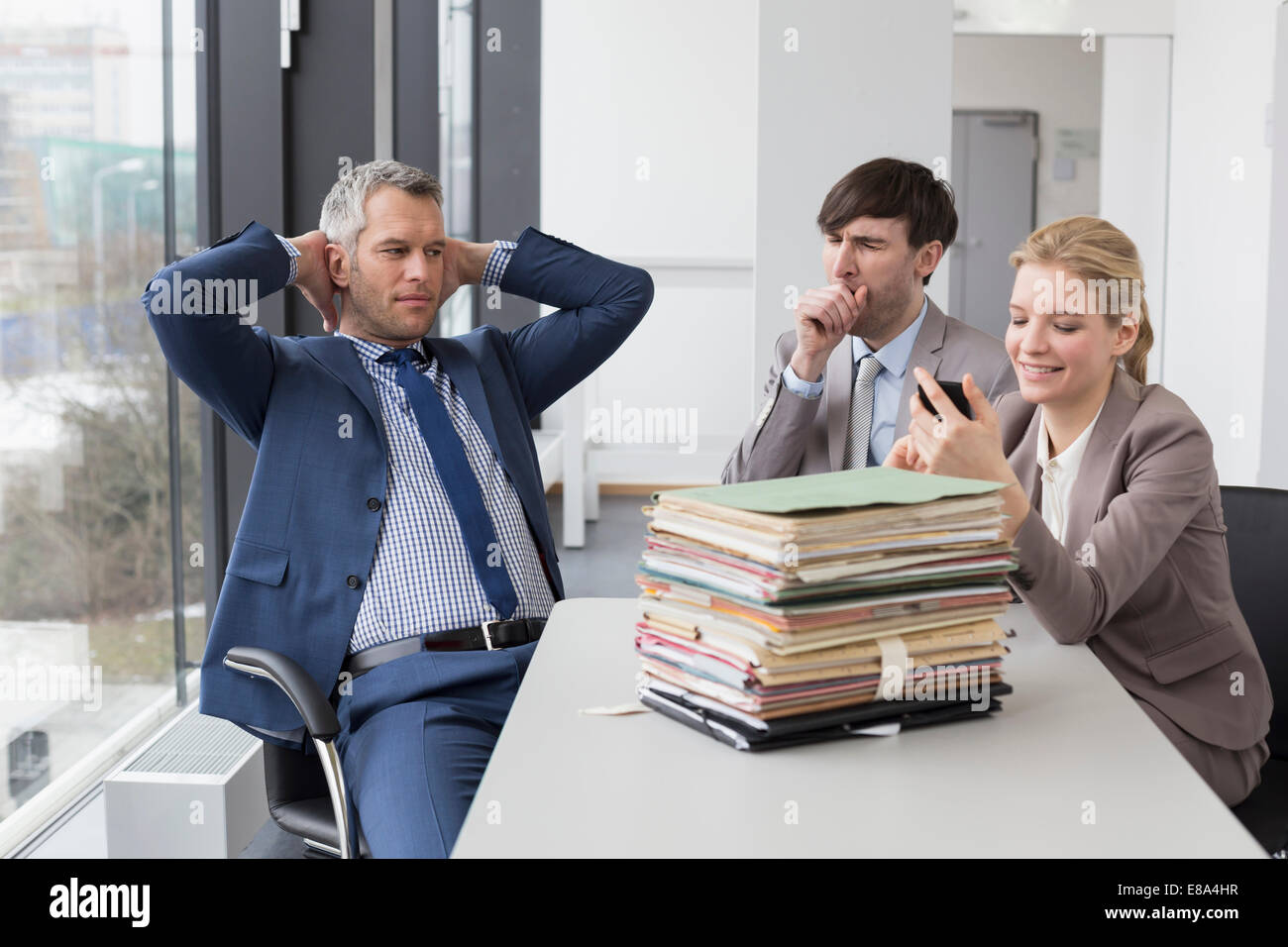Colleagues feels bored in office Stock Photo - Alamy