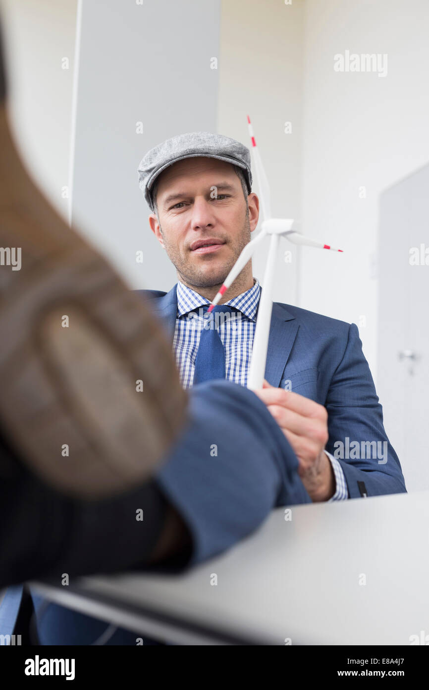 Portrait of businessman with wind power model Stock Photo - Alamy