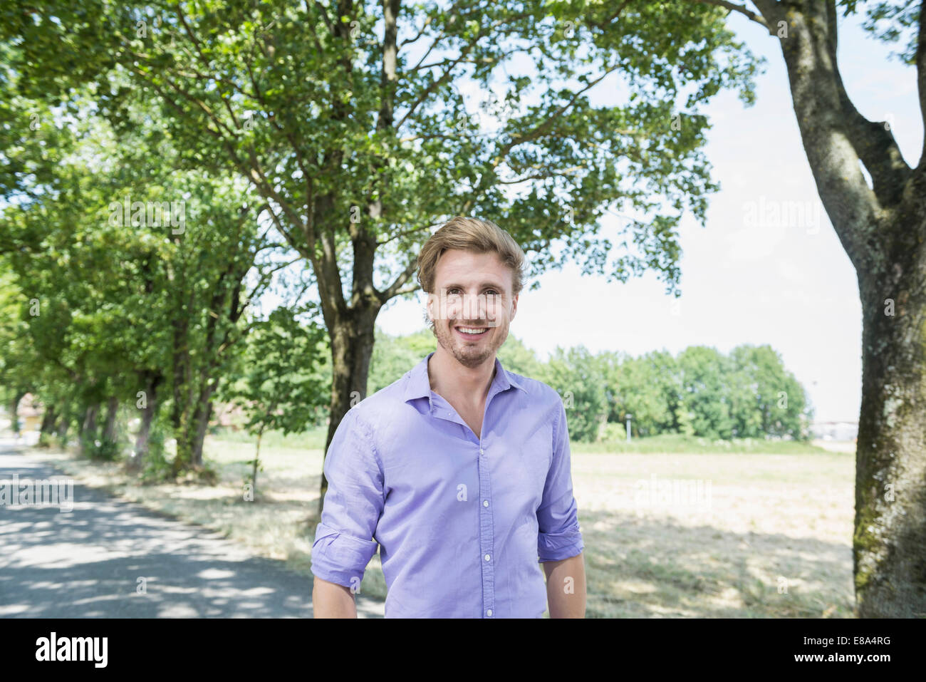 Portrait of mid adult man, smiling Stock Photo - Alamy