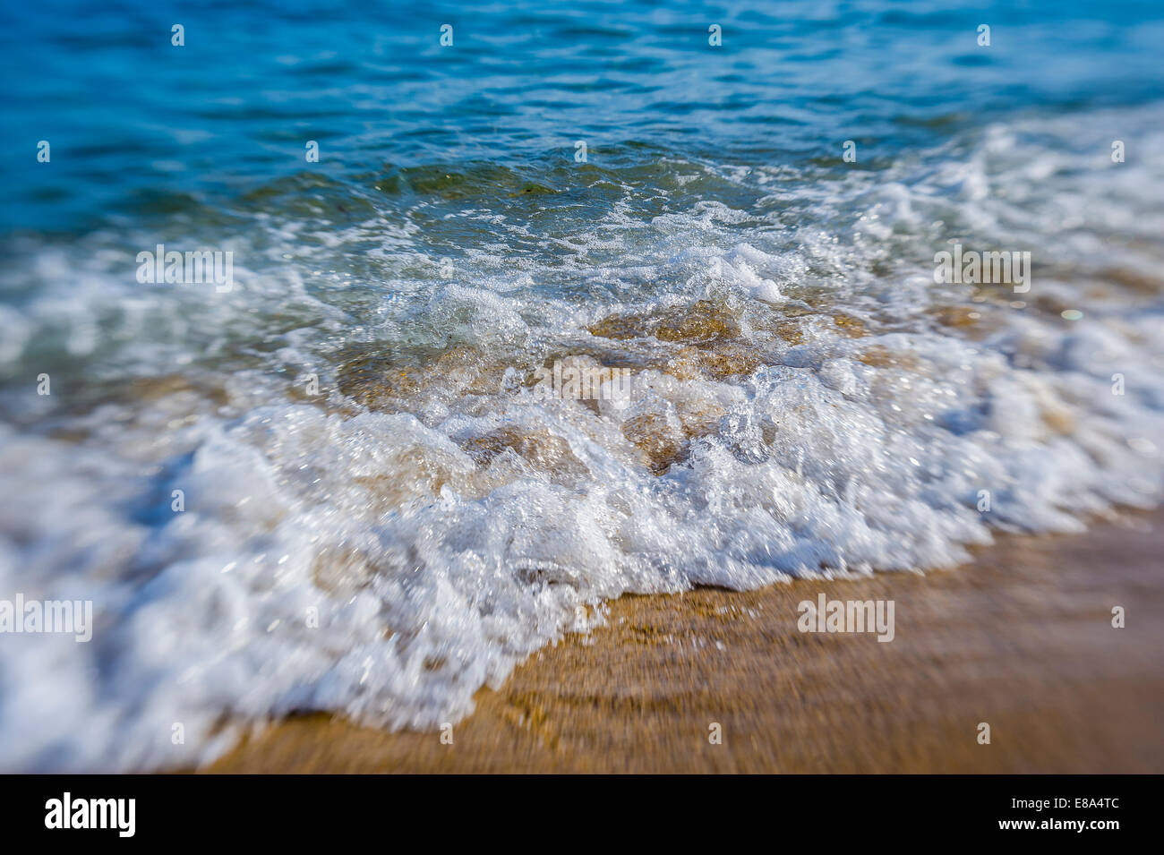 Sandy beach small waves hi-res stock photography and images - Alamy
