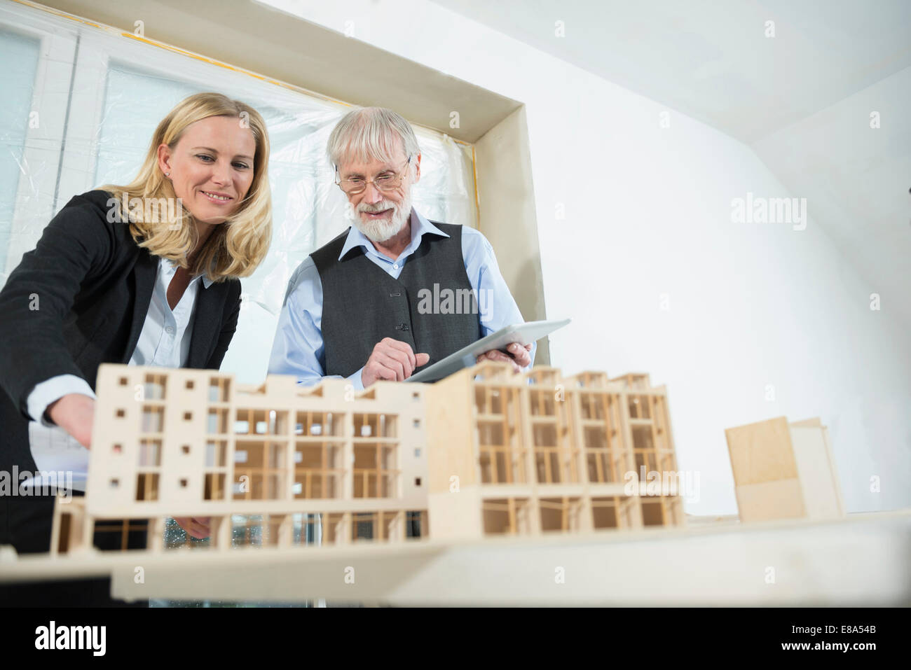 Woman watching architectural model hi-res stock photography and images ...