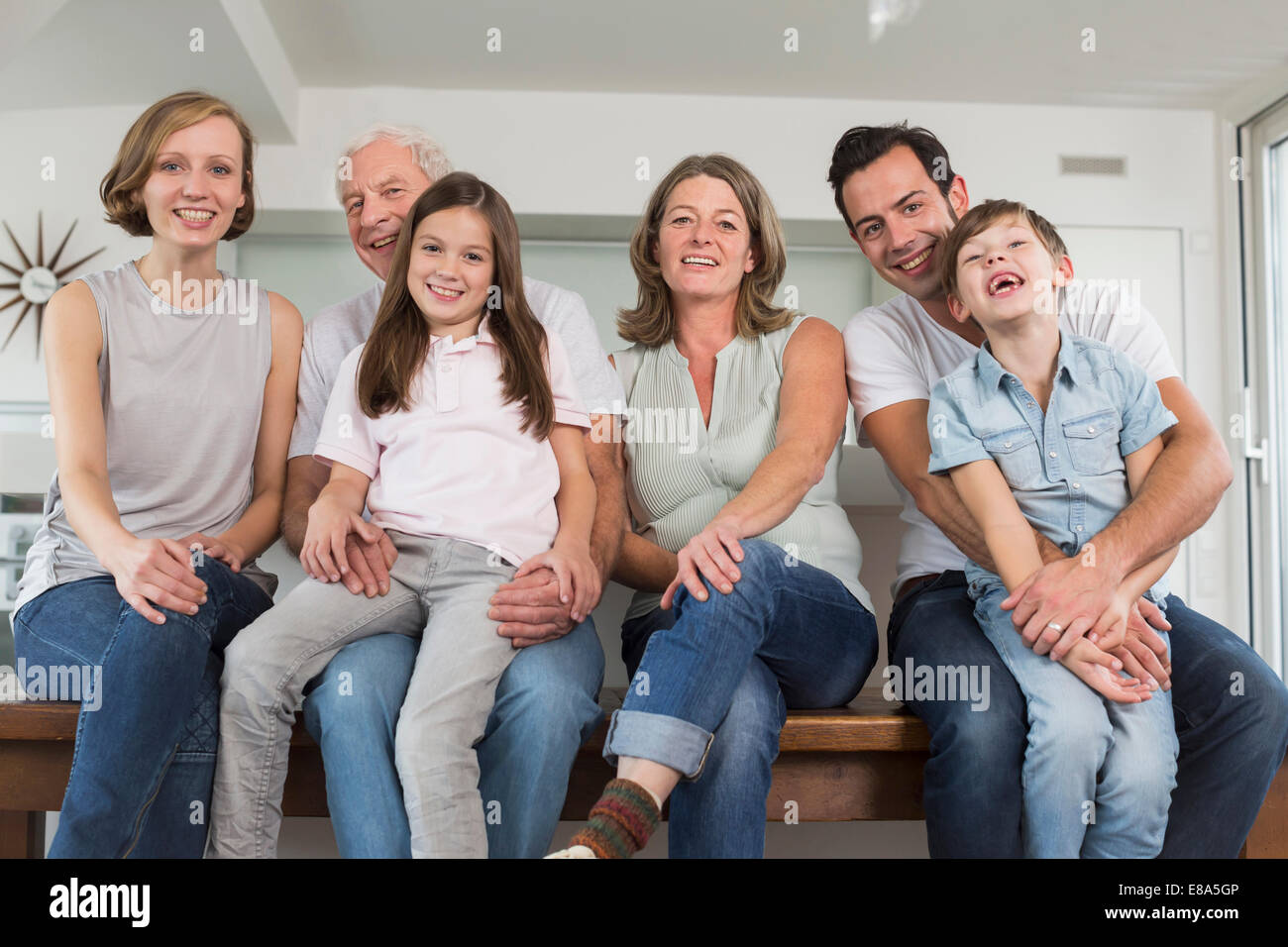 Smiling extended family side by side, portrait Stock Photo - Alamy
