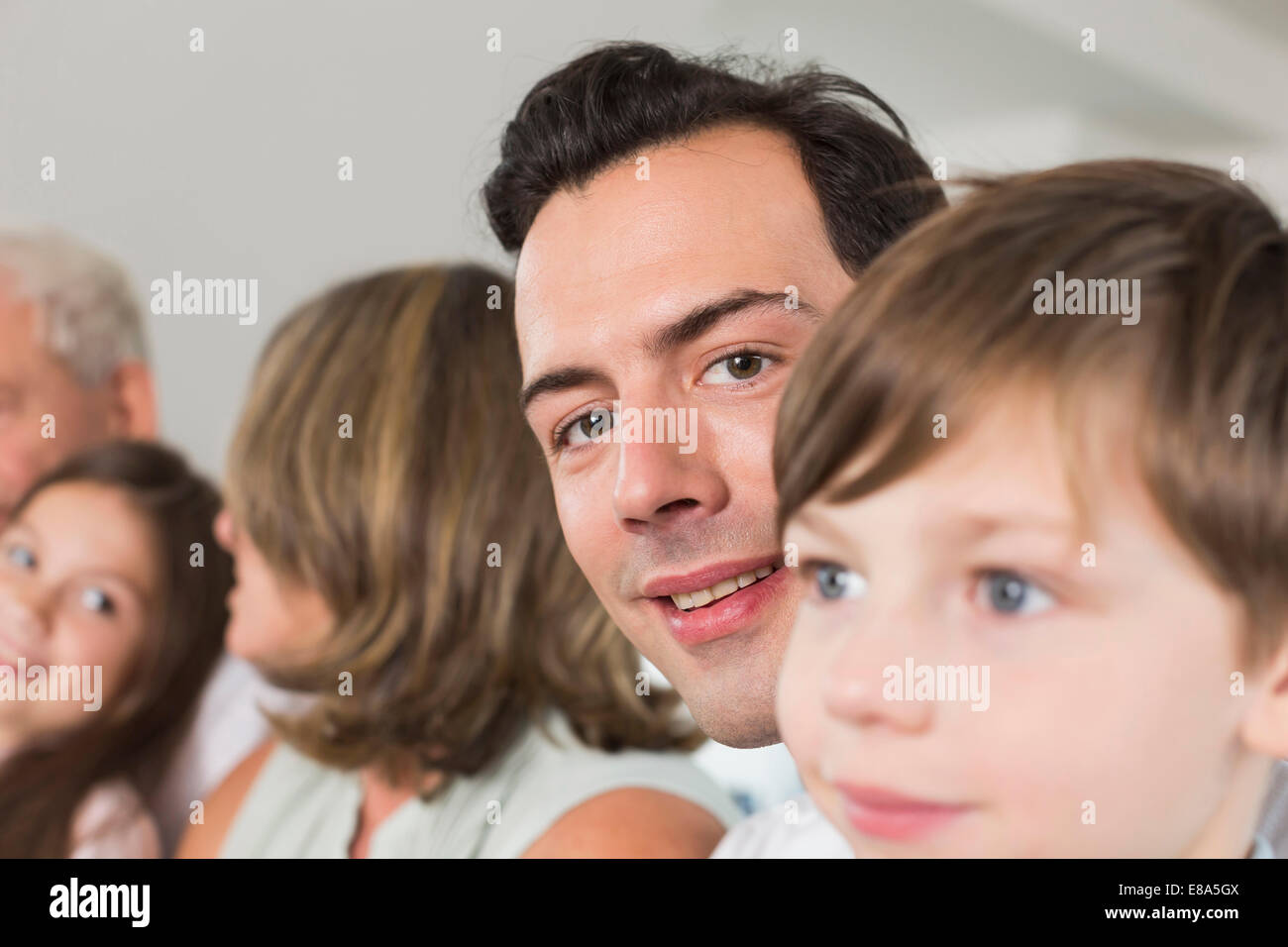 Smiling extended family side by side, portrait Stock Photo - Alamy