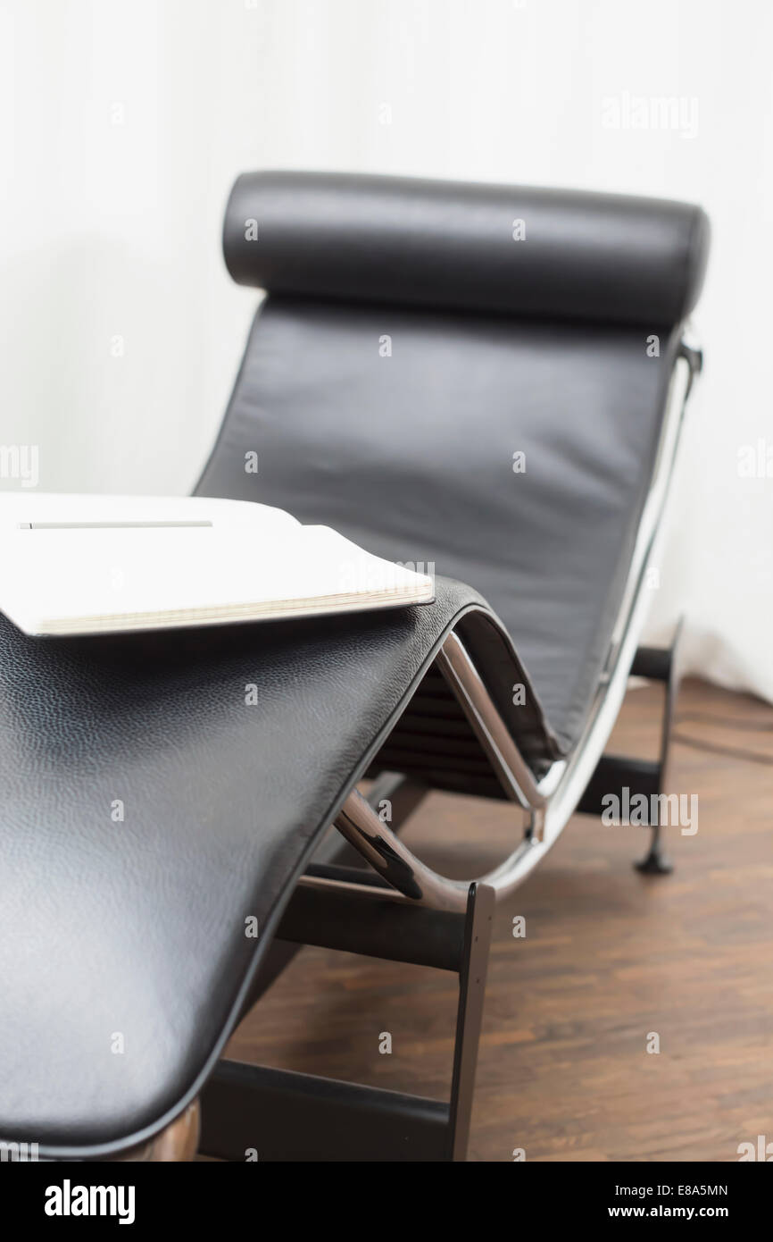 Notebook on deck chair Stock Photo - Alamy