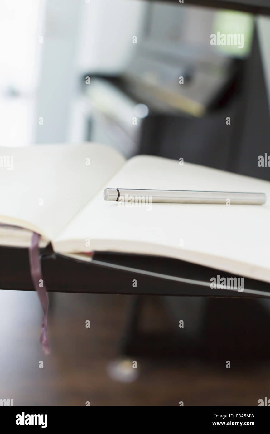 Notebook with pen, close up Stock Photo - Alamy