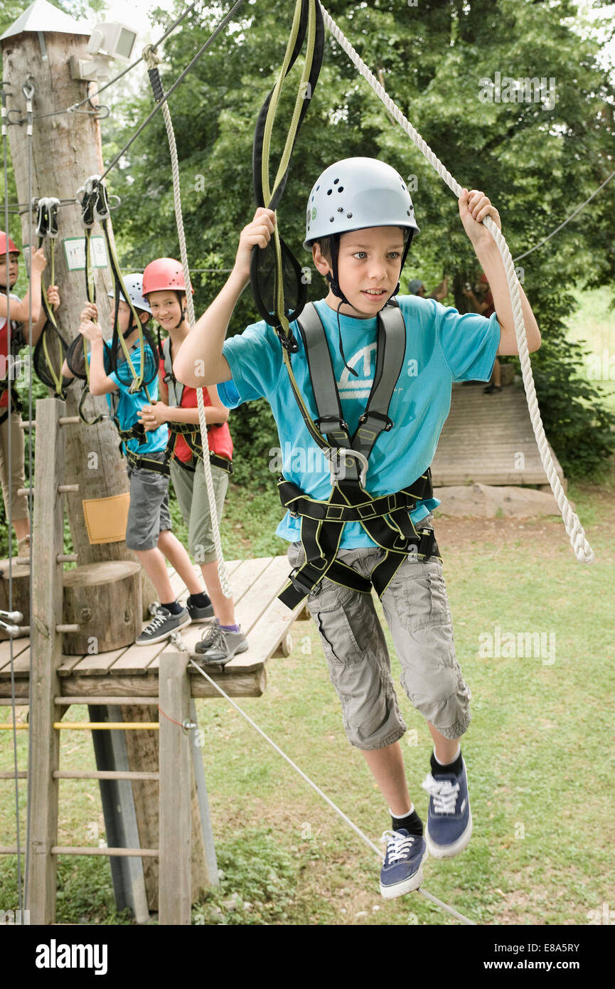 Girls and boy climbing crag hi-res stock photography and images - Alamy