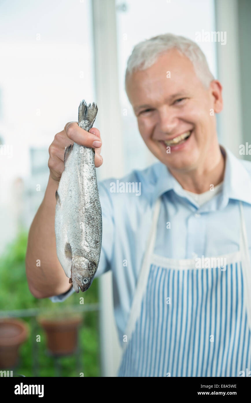 Chef man hold trout hi-res stock photography and images - Alamy