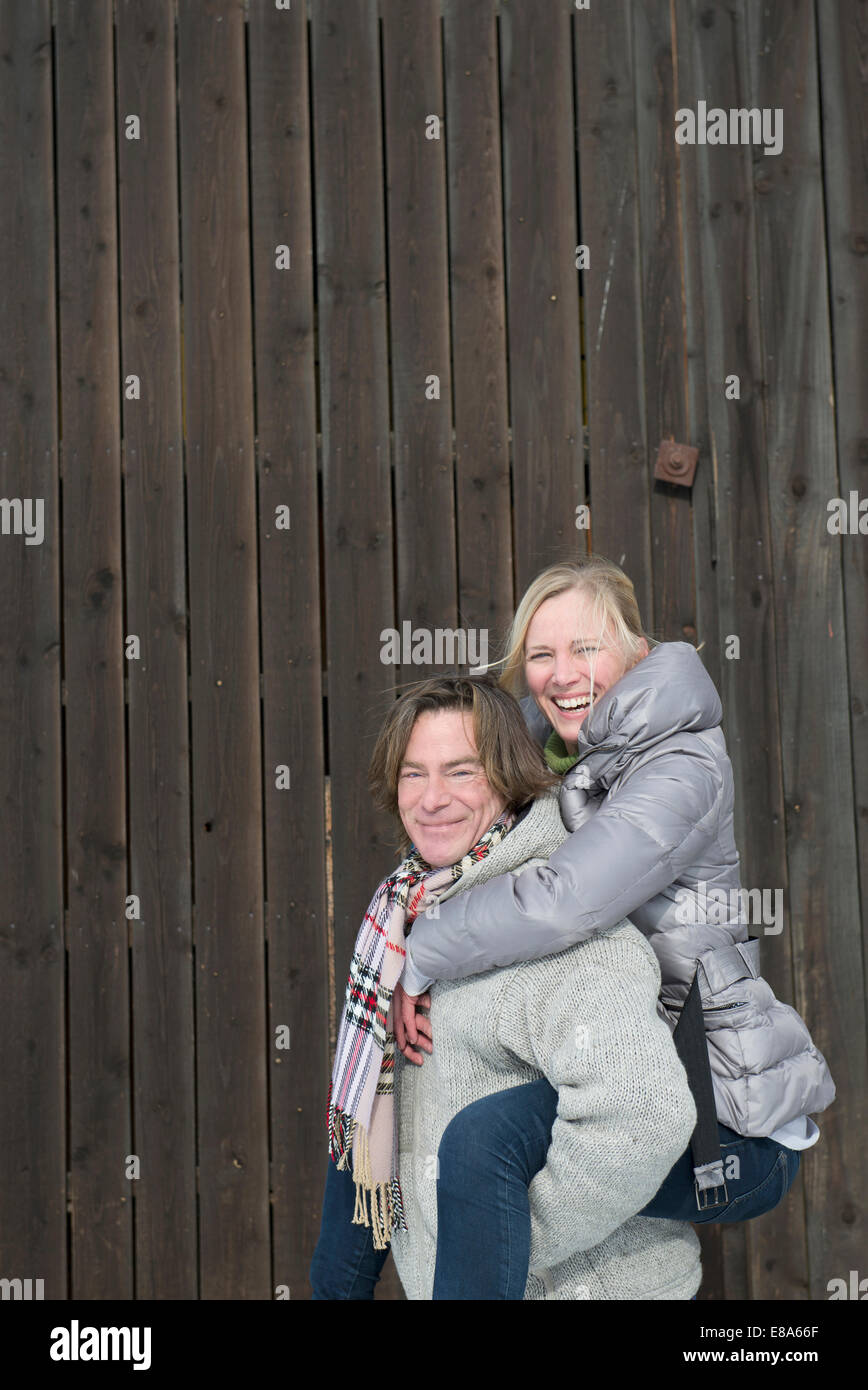 Piggy back adults hi-res stock photography and images - Alamy