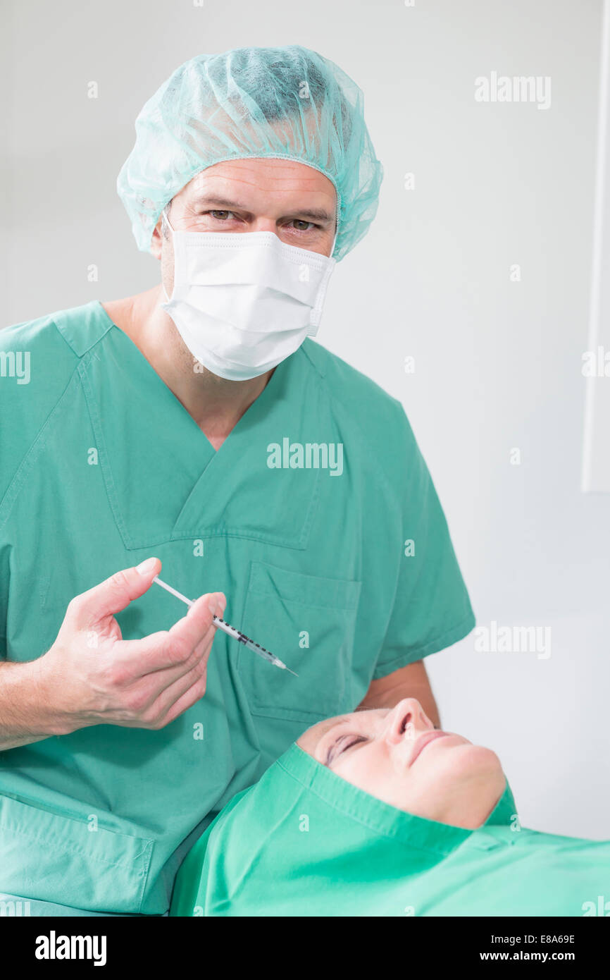 Male plastic surgeon female hi-res stock photography and images - Alamy