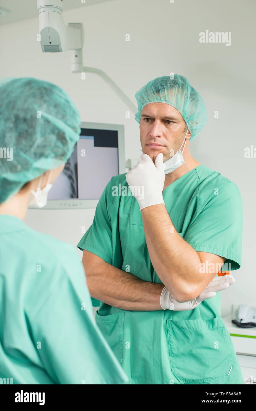 Doctors discussing operation Stock Photo - Alamy