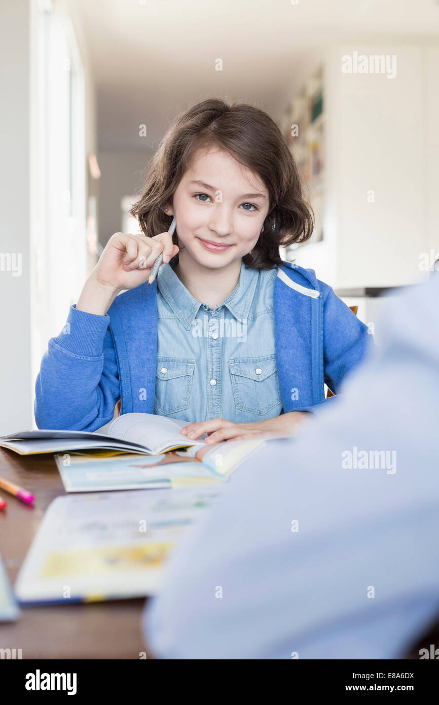 Boy doing homework color pencil hi-res stock photography and images - Alamy