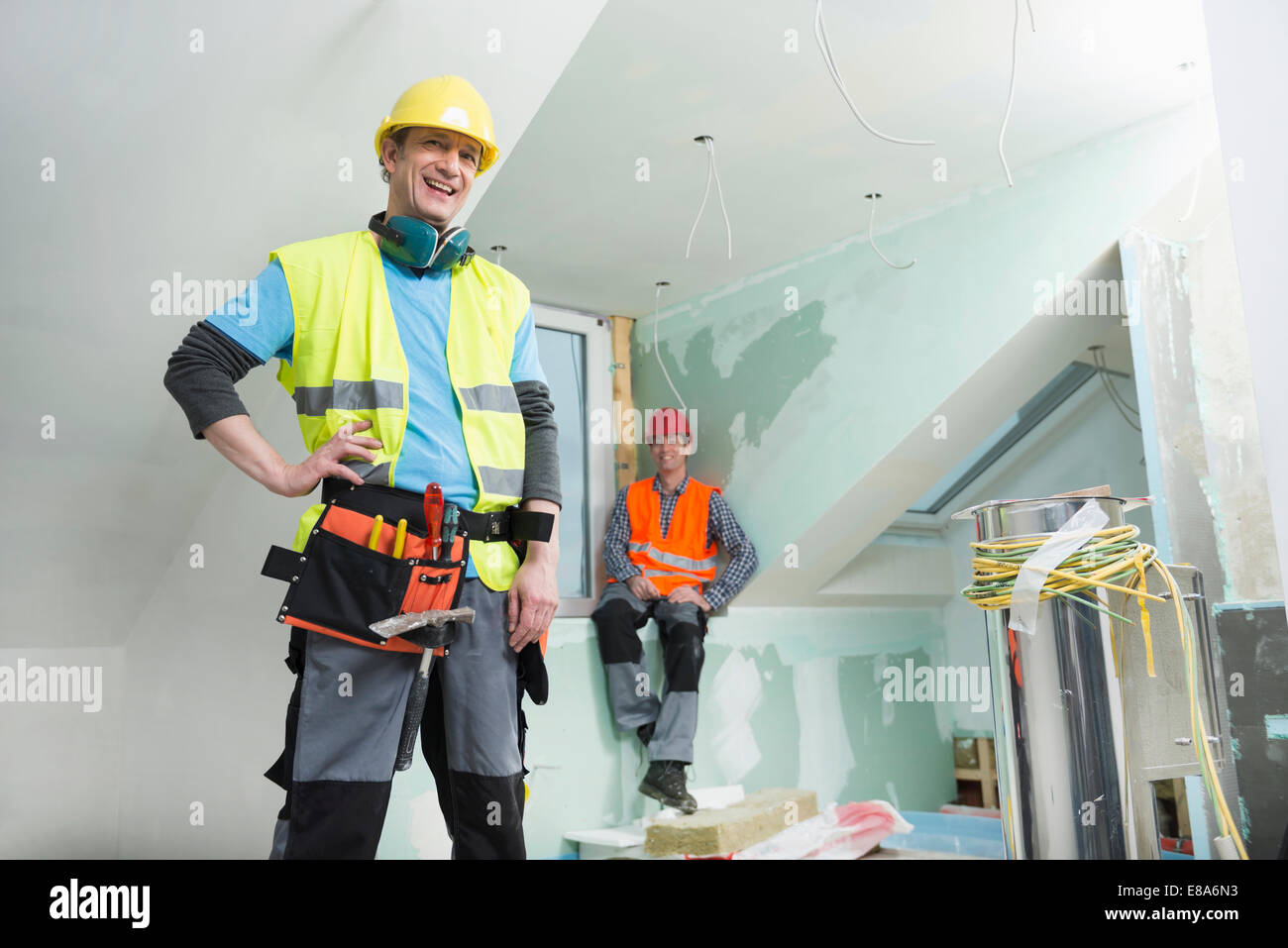 Building site workers sitting on hi-res stock photography and images ...