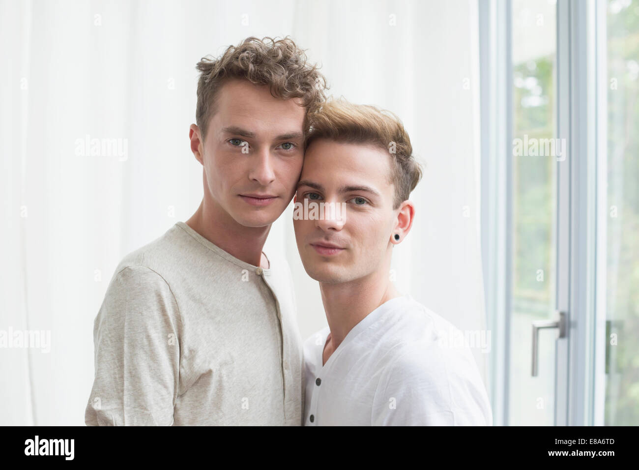 Portrait of homosexual couple, smiling Stock Photo - Alamy