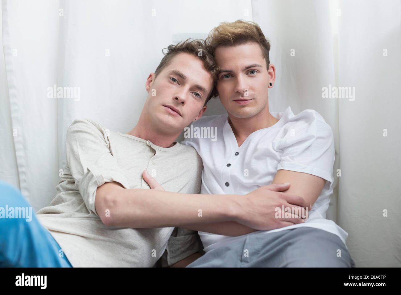 Homosexual couple hugging each other hi-res stock photography and images - Alamy