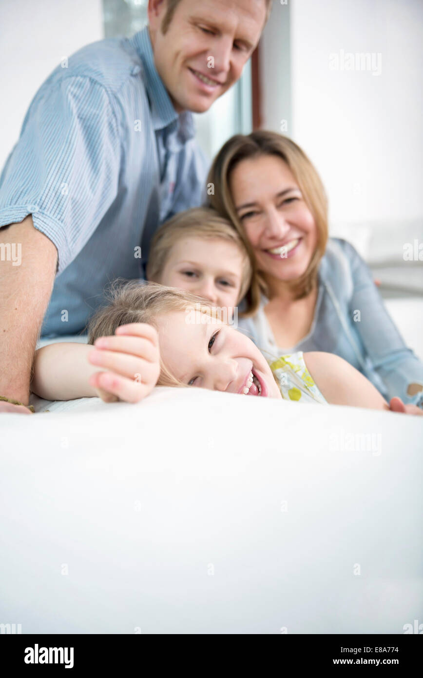 Happy family with two kids at home Stock Photo - Alamy
