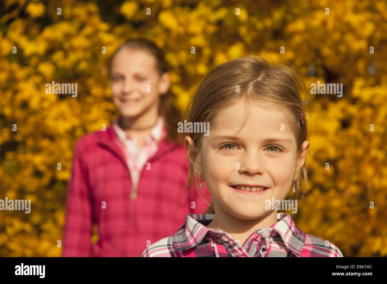 Sisters smiling, portrait Stock Photo - Alamy