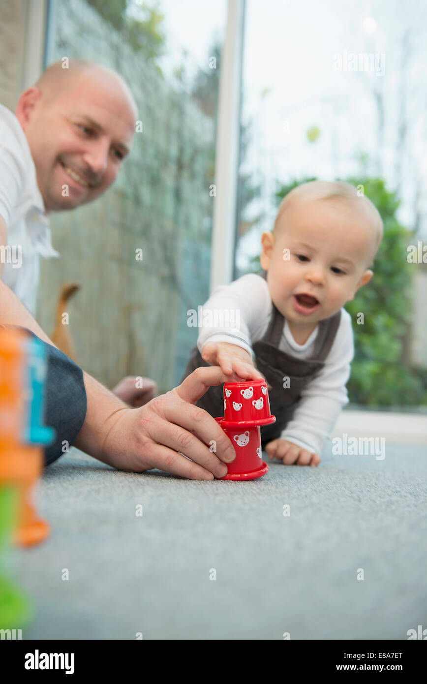 Father and his little son playing together Stock Photo - Alamy
