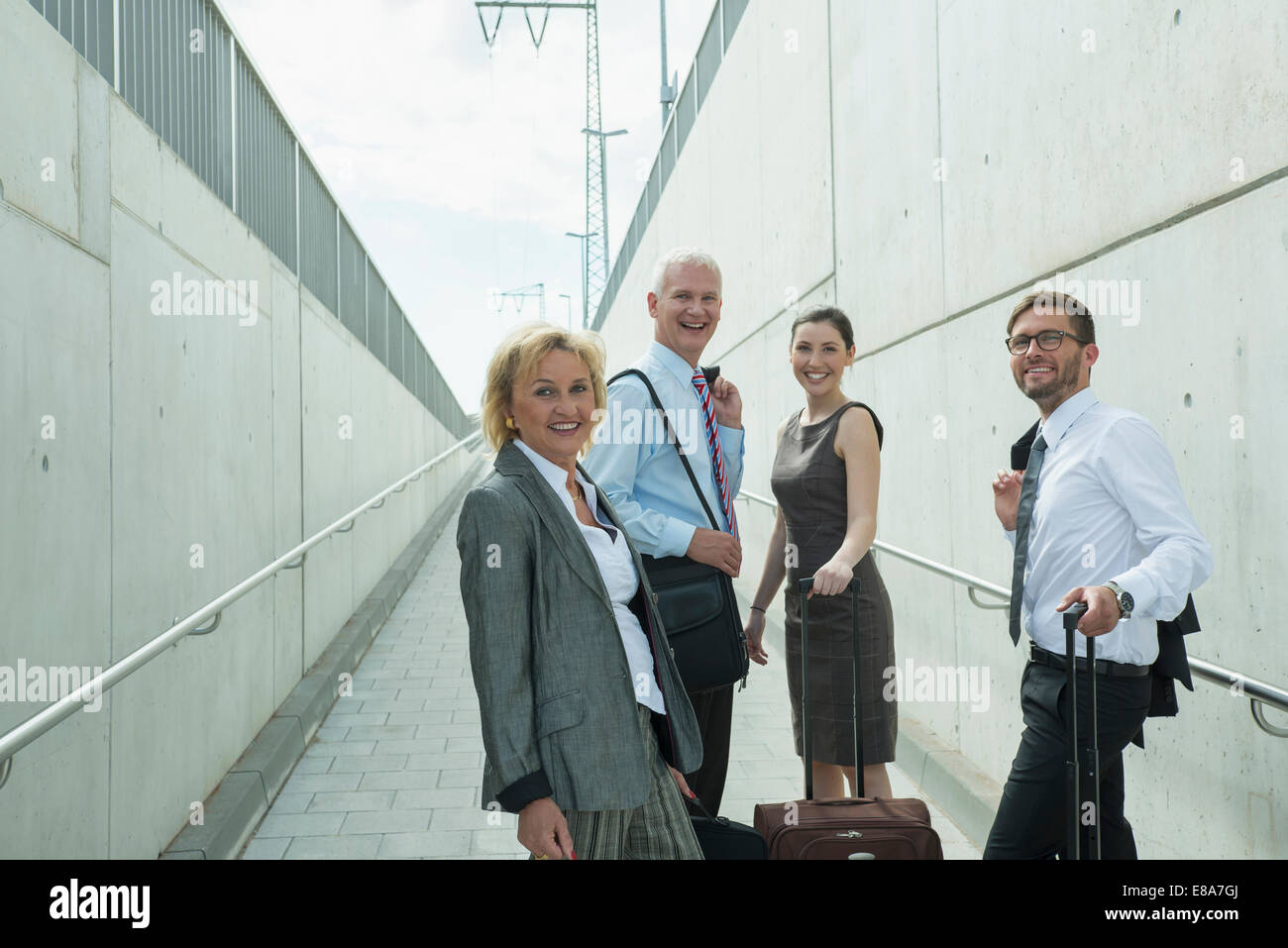 four colleagues on business travel Stock Photo - Alamy