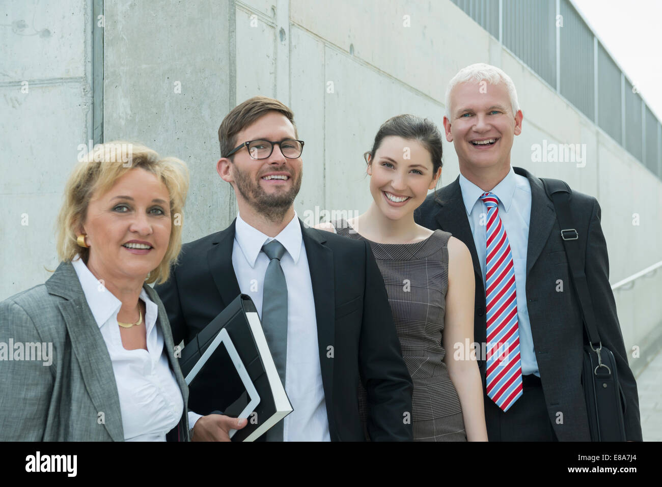 group picture of four business partners Stock Photo - Alamy