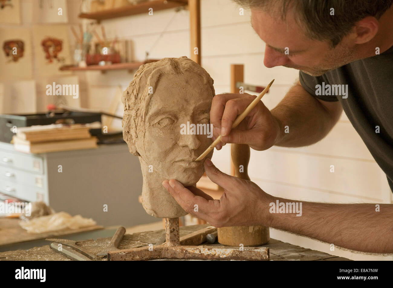 Mature man shaping model Stock Photo - Alamy