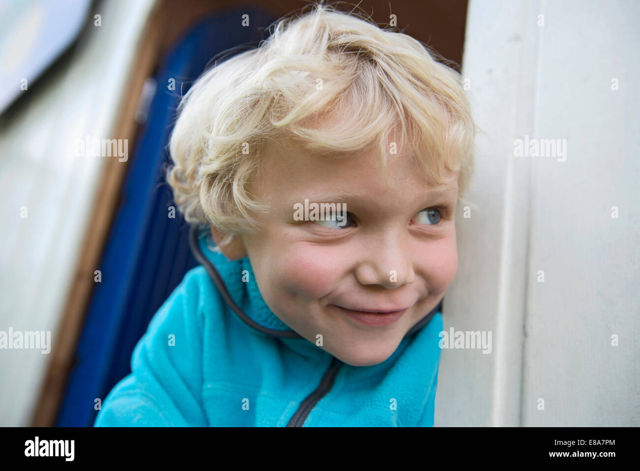 Close up portrait of young cheeky blonde boy Stock Photo - Alamy