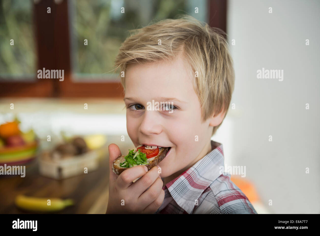 Biting off piece hi-res stock photography and images - Alamy