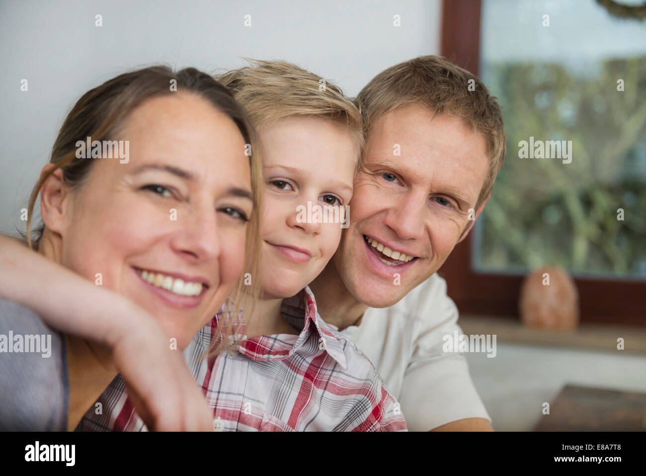 Embrace people son two parents hi-res stock photography and images - Alamy