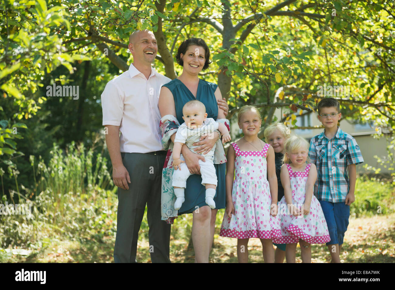 Family portrait of parents and five children Stock Photo - Alamy