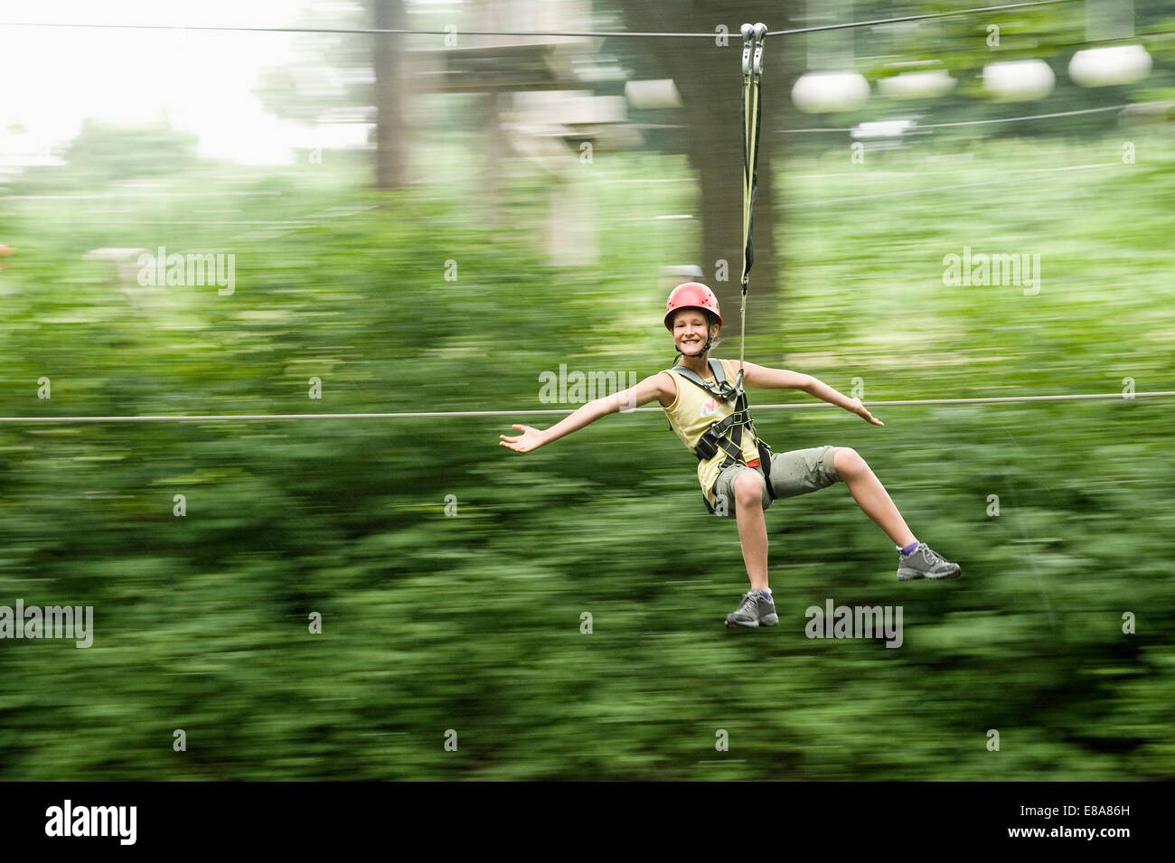 Girl spinning round at crag Stock Photo - Alamy