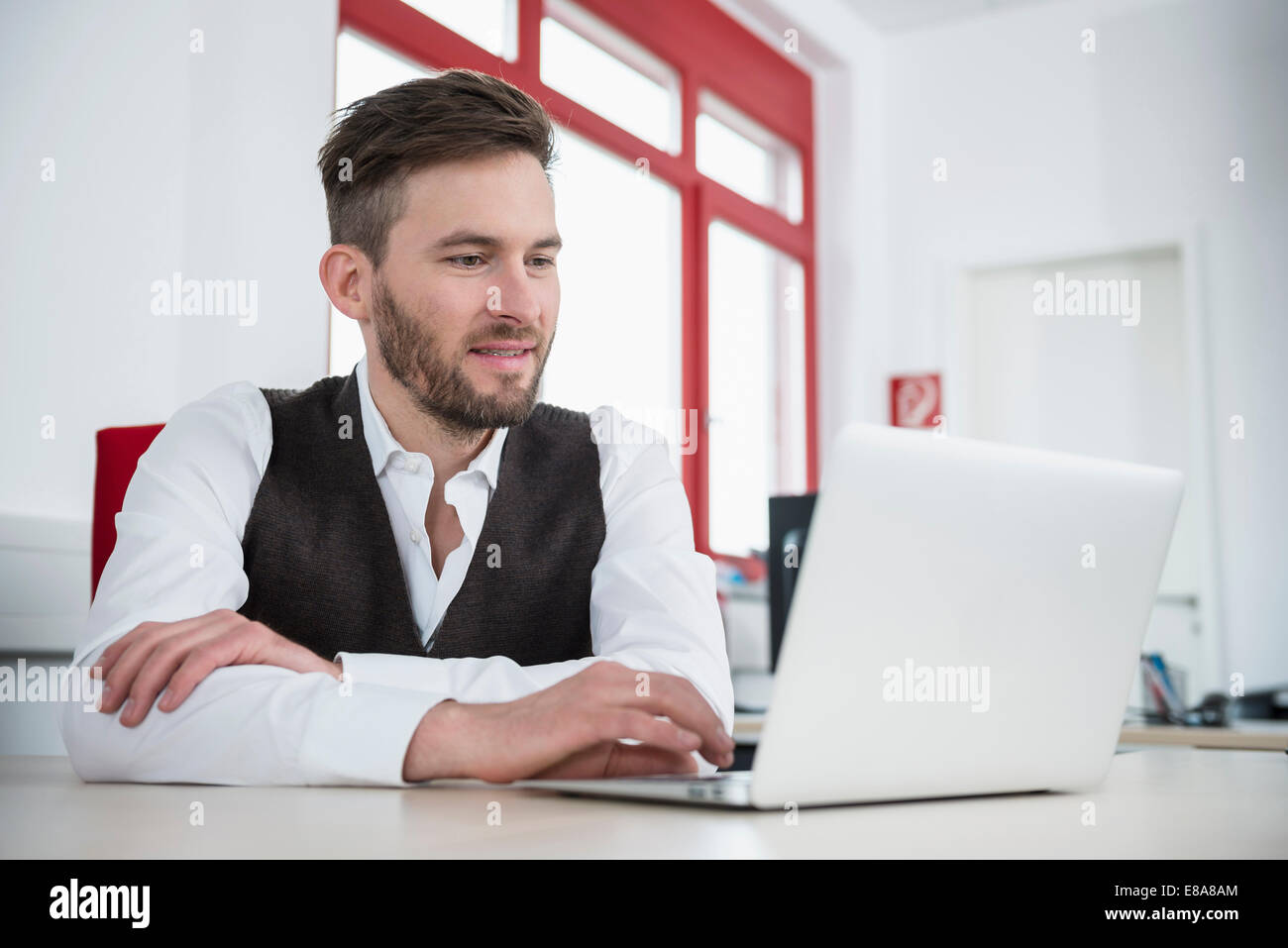 Man portrait working office typing computer Stock Photo - Alamy