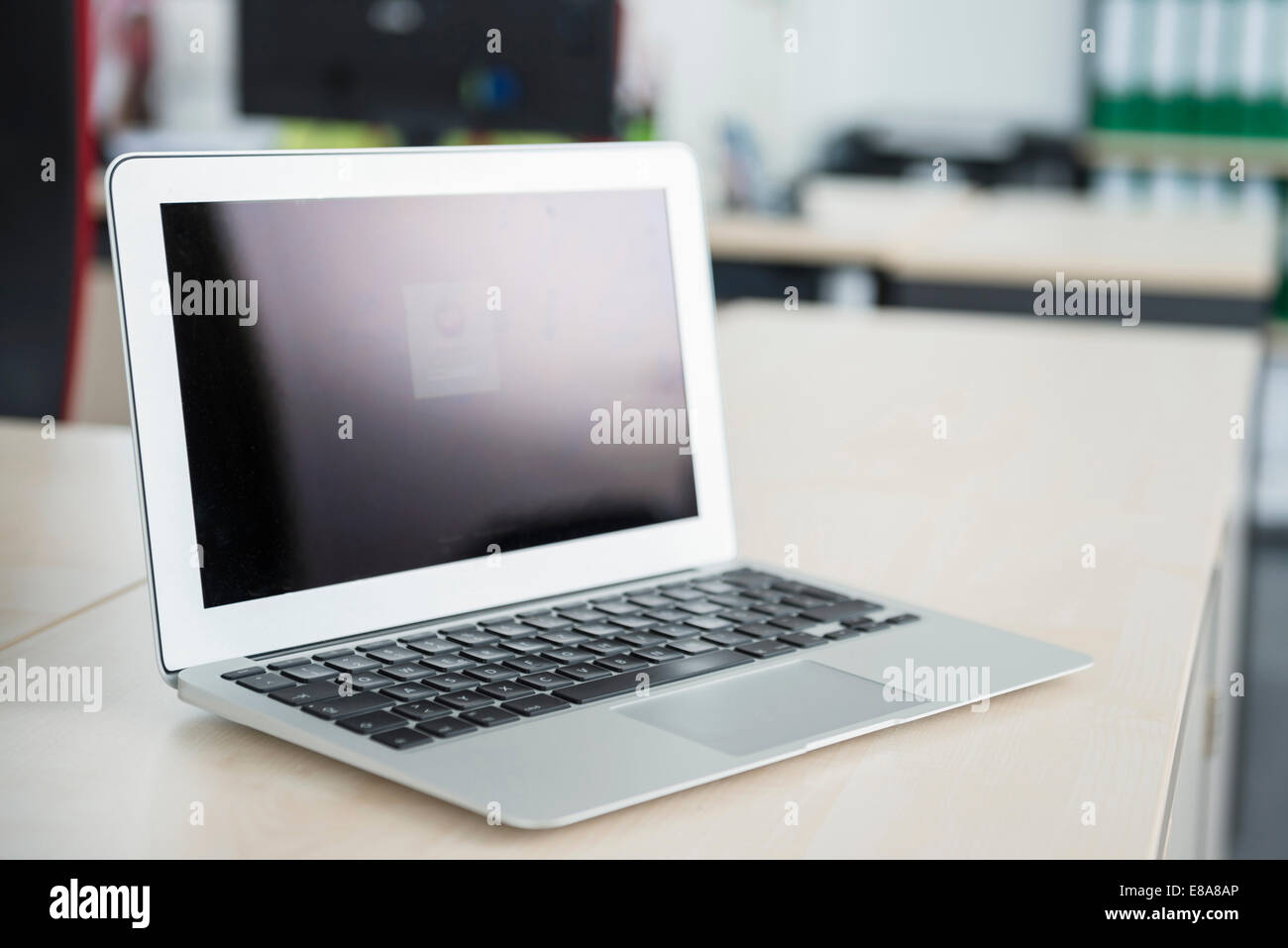 Empty office desk modern laptop computer Stock Photo - Alamy