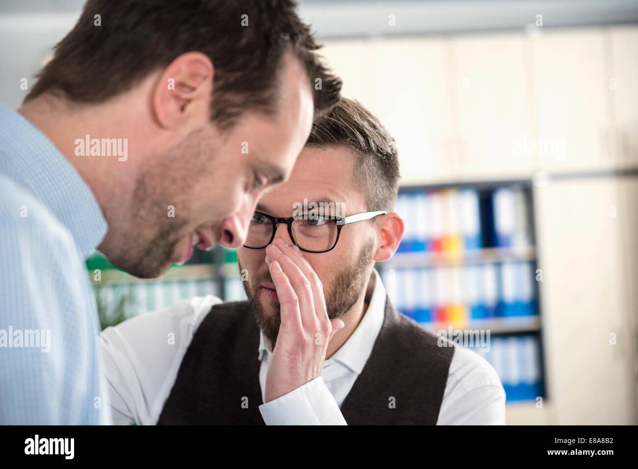 Office Talking Secret High Resolution Stock Photography and Images - Alamy