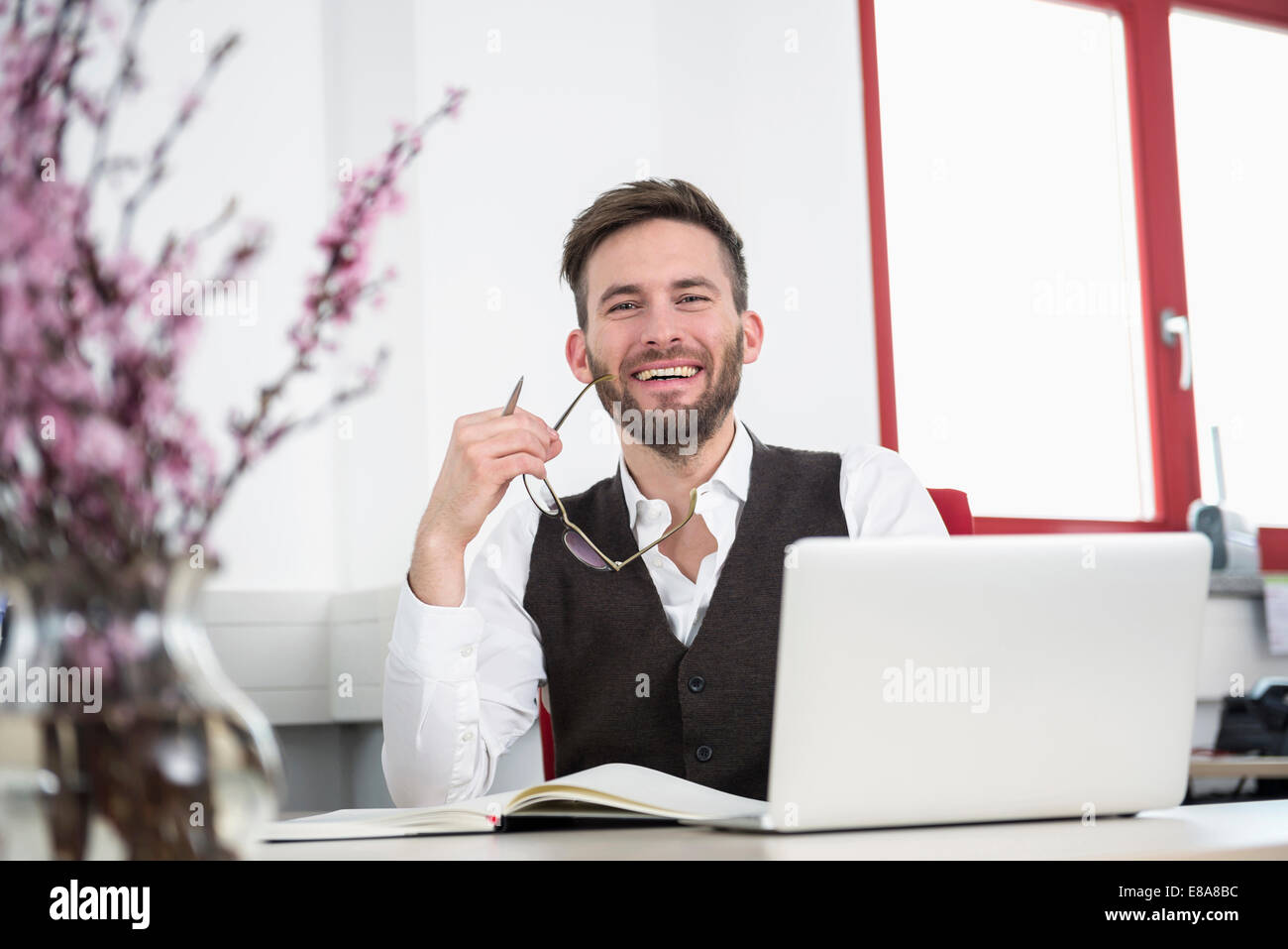 businessman laughing desk office computer Stock Photo - Alamy
