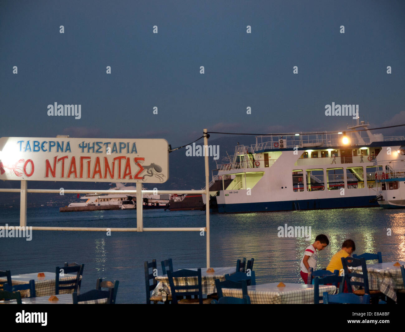 A Greek taverna by the water's edge on the island of Elafonisos Stock ...