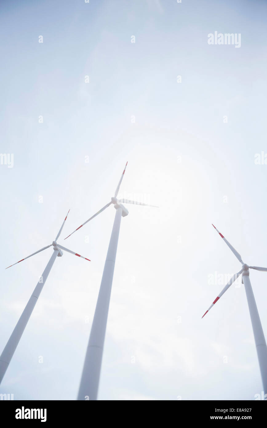 Three wind turbines energy electricity Stock Photo - Alamy