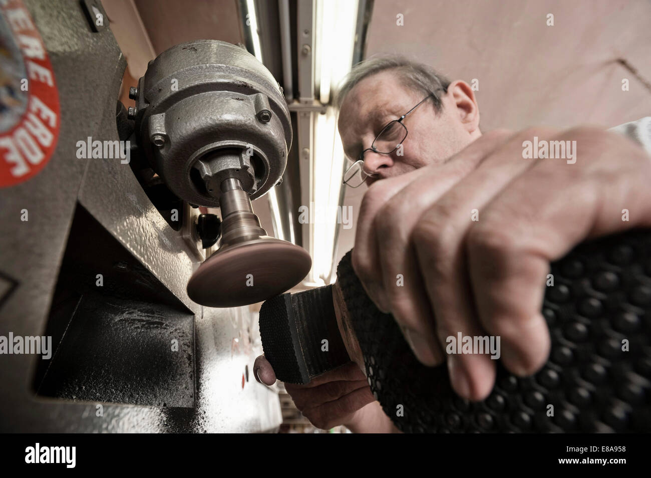 Cobbler working in workshop, close-up Stock Photo - Alamy