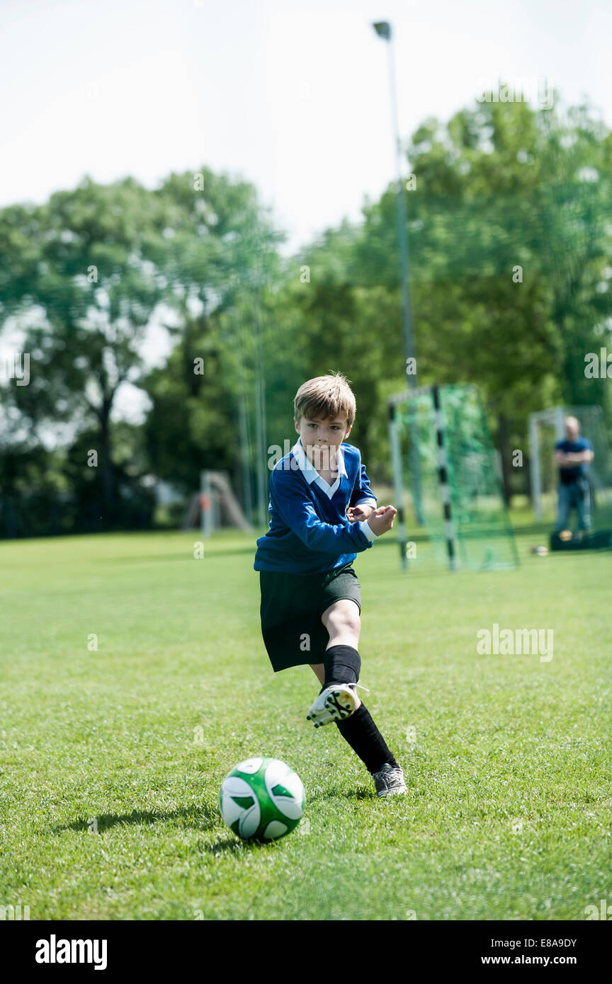 Young boy soccer penalty practice football ball Stock Photo - Alamy