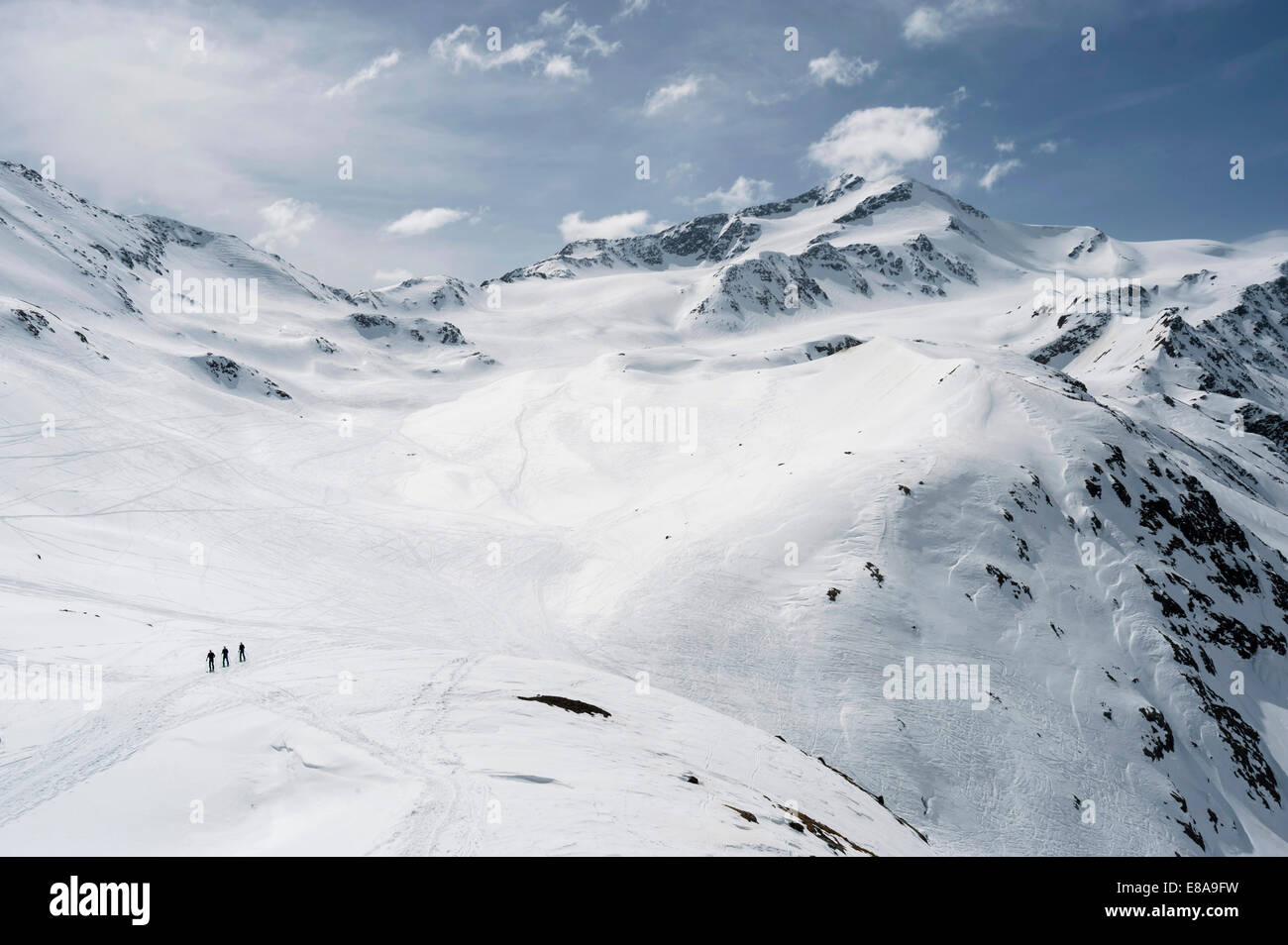 High mountains Alps landscape skiers snow Stock Photo - Alamy