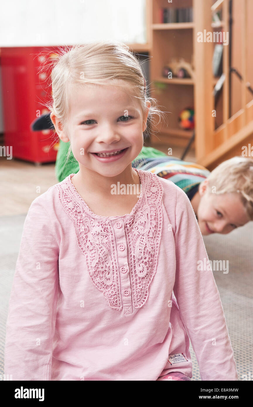Portrait of smiling little girl in kindergarten Stock Photo - Alamy