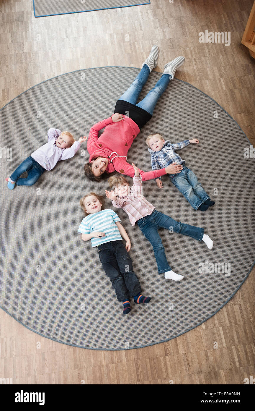 Boy and girl lying on the ground hi-res stock photography and images ...
