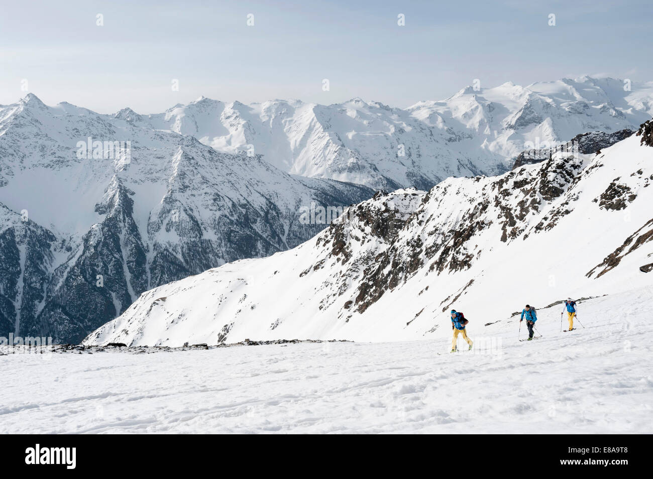 Alps mountains skiers cross-country winter Stock Photo - Alamy