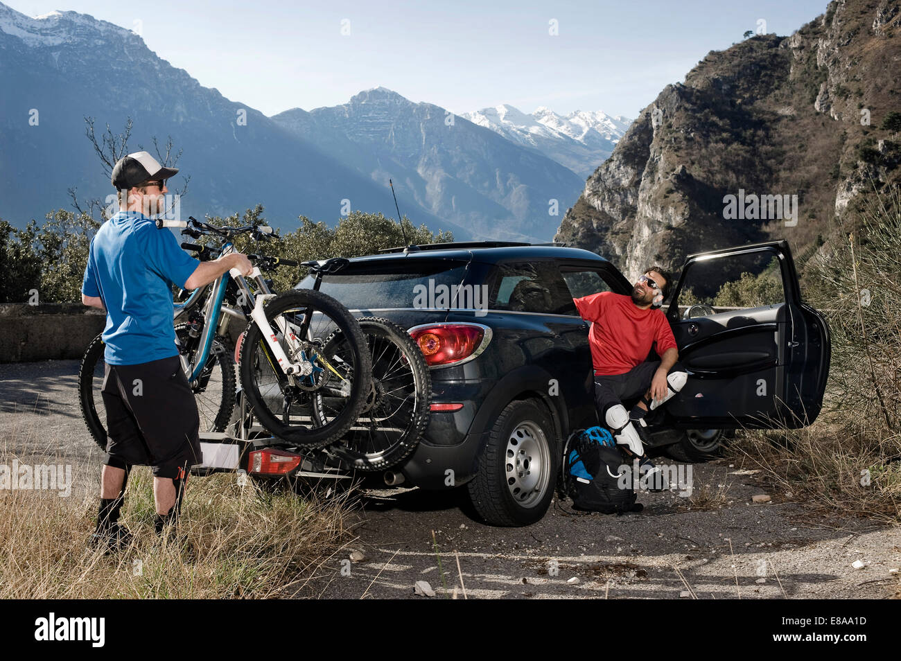Taking off helmet hi-res stock photography and images - Alamy