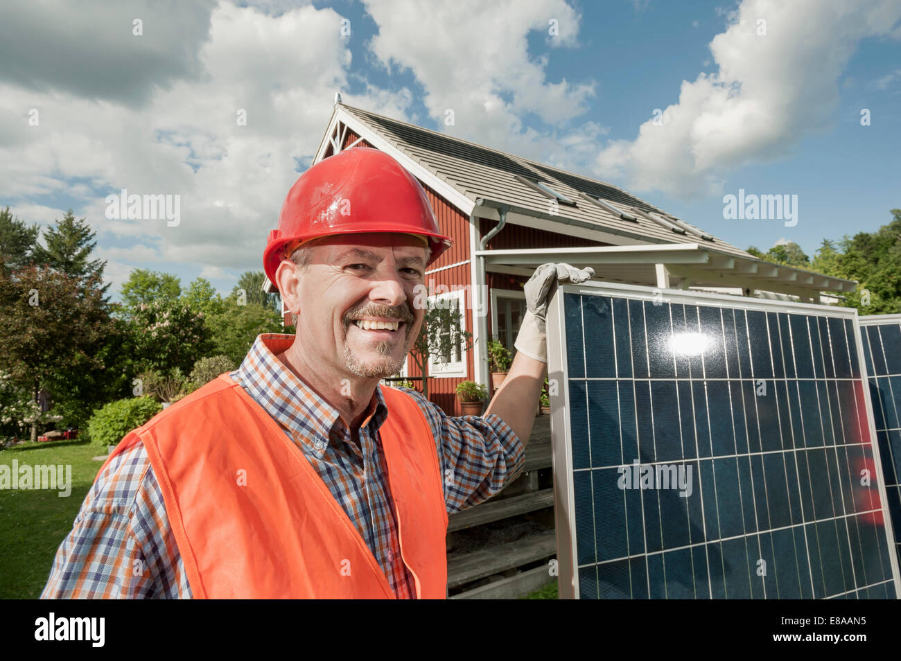 Portrait smiling solar panel hi-res stock photography and images - Alamy