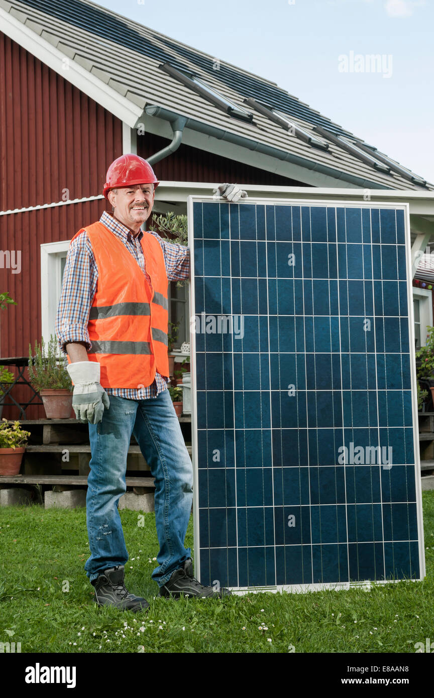 Installing solar panel in garden hi-res stock photography and images ...