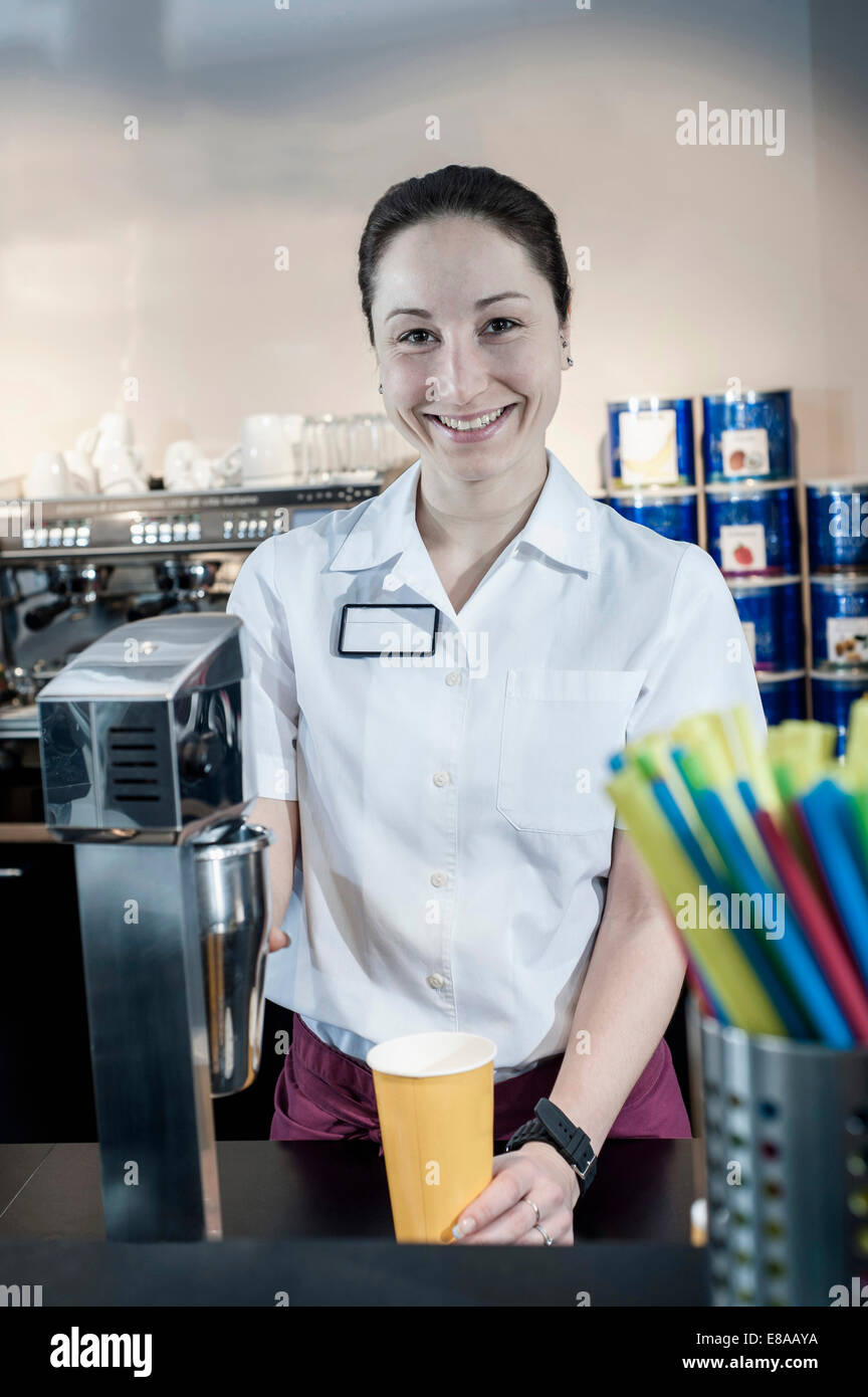 Waitress at the bar of a gym Stock Photo - Alamy