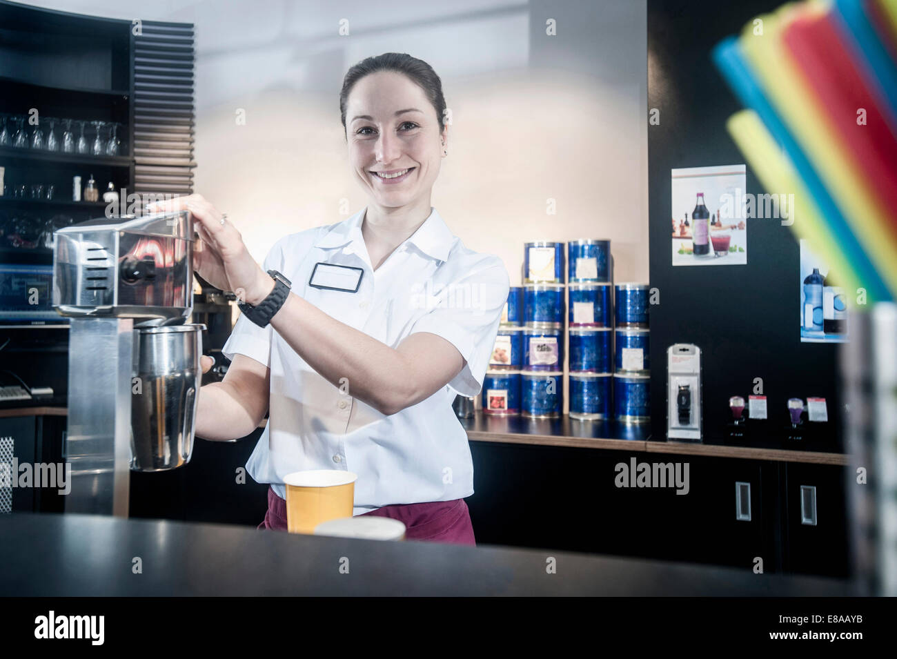 Waitress at the bar of a gym Stock Photo - Alamy