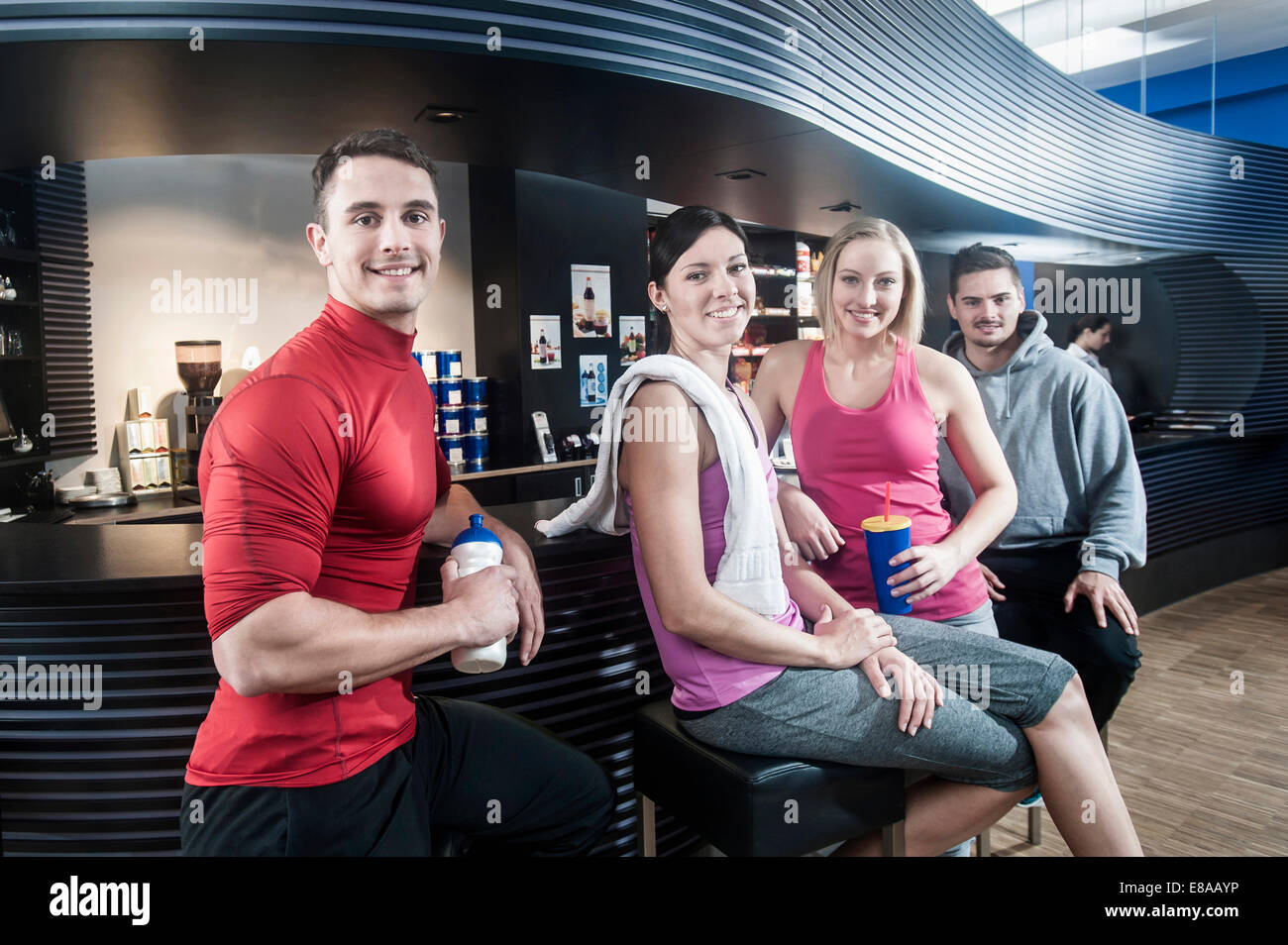 Friends meeting at the bar of a gym Stock Photo - Alamy