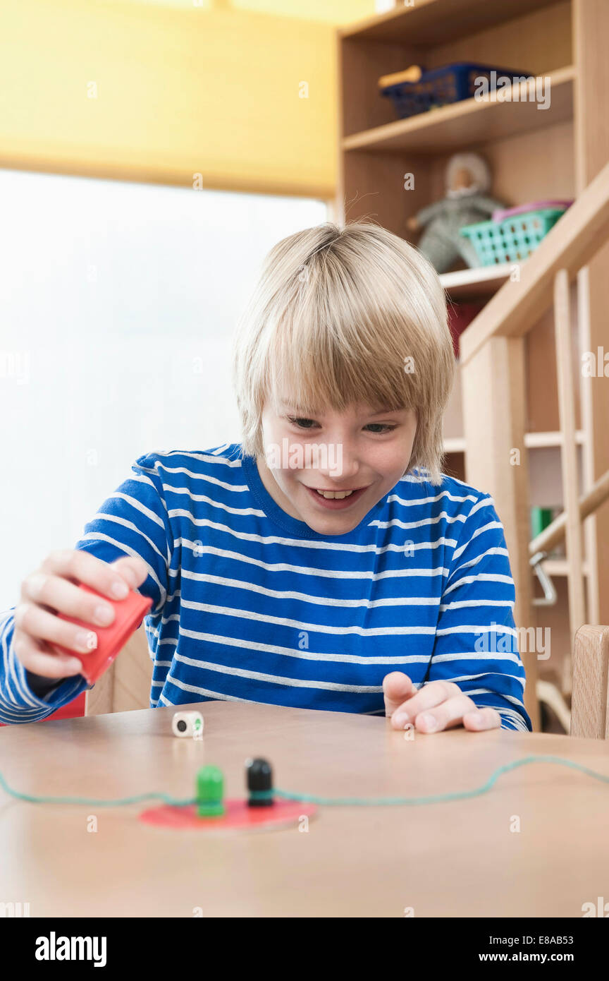 Portrait of playing boy Stock Photo - Alamy