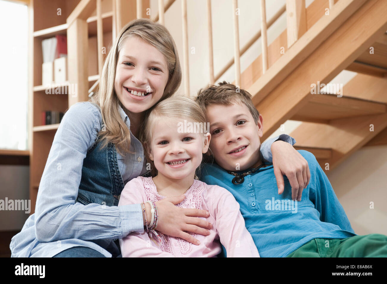 Portrait of three siblings Stock Photo - Alamy