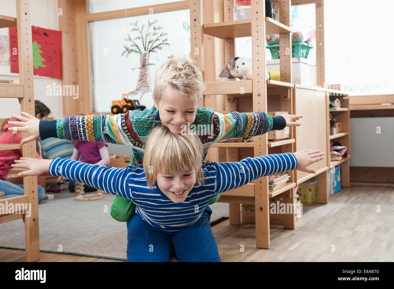 Two brothers playing together Stock Photo - Alamy
